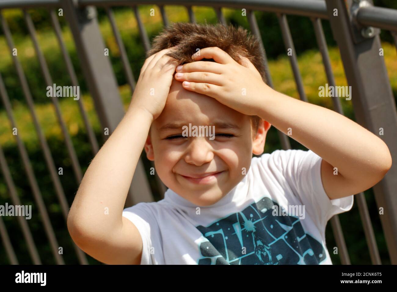 beautiful dark caucasian child who desperate Stock Photo - Alamy