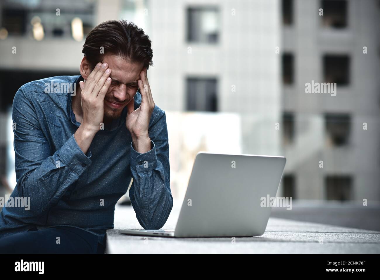 Fail. Businessman failed his project closed his face. Young freelancer ...