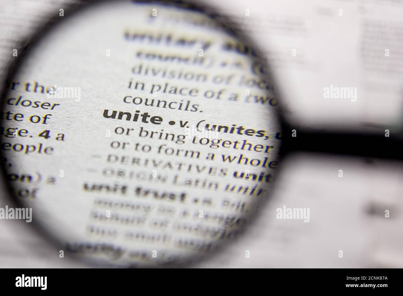 Word or phrase Unite in a dictionary Stock Photo - Alamy