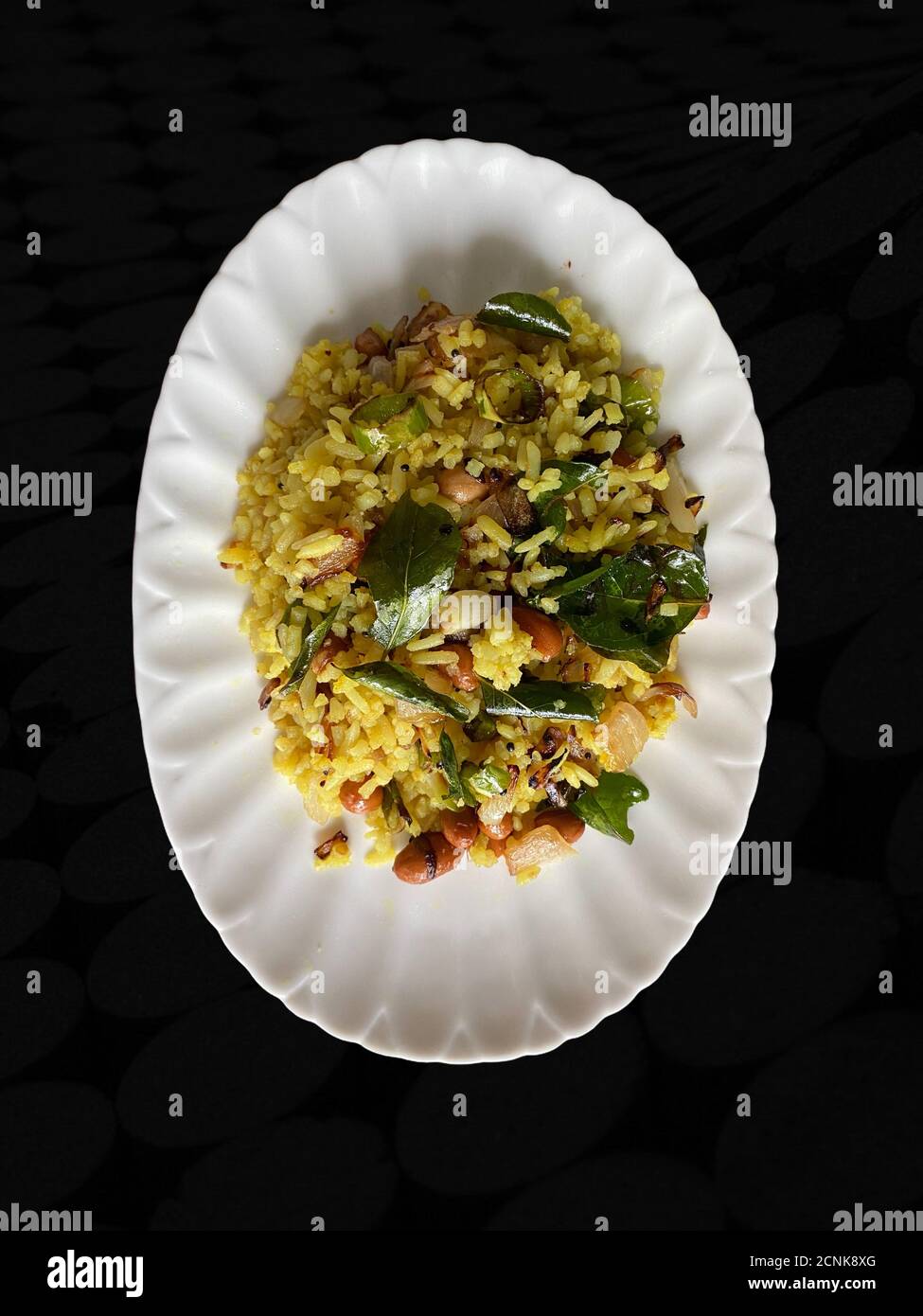 beaten rice or pooha with ginger pickle being served in a plate Stock ...