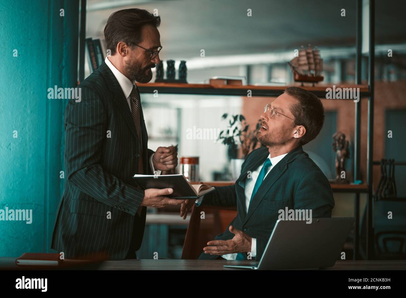 Group of men one woman sitting hi-res stock photography and images - Alamy
