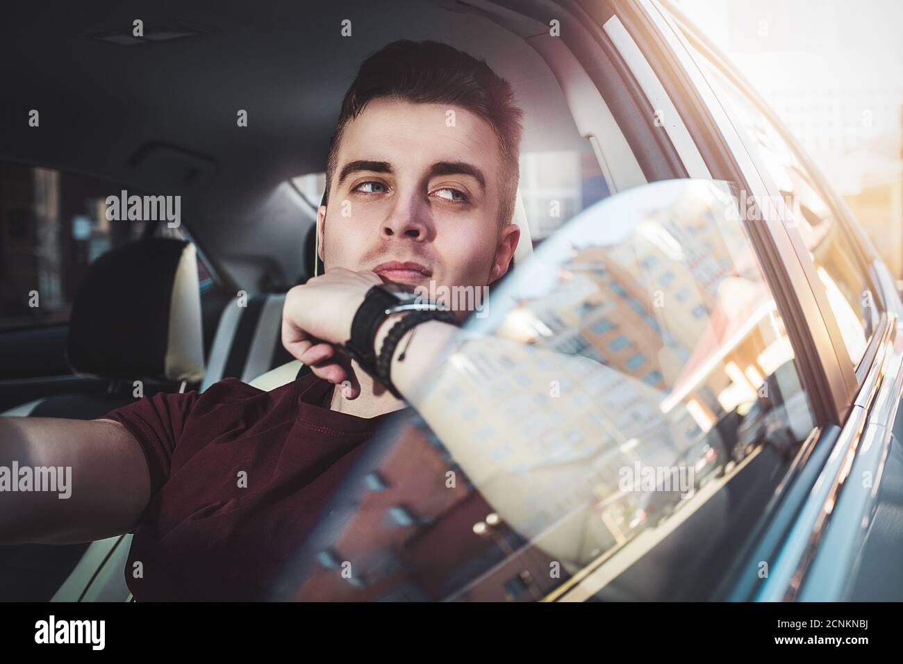 Happy man driving car hi-res stock photography and images - Alamy