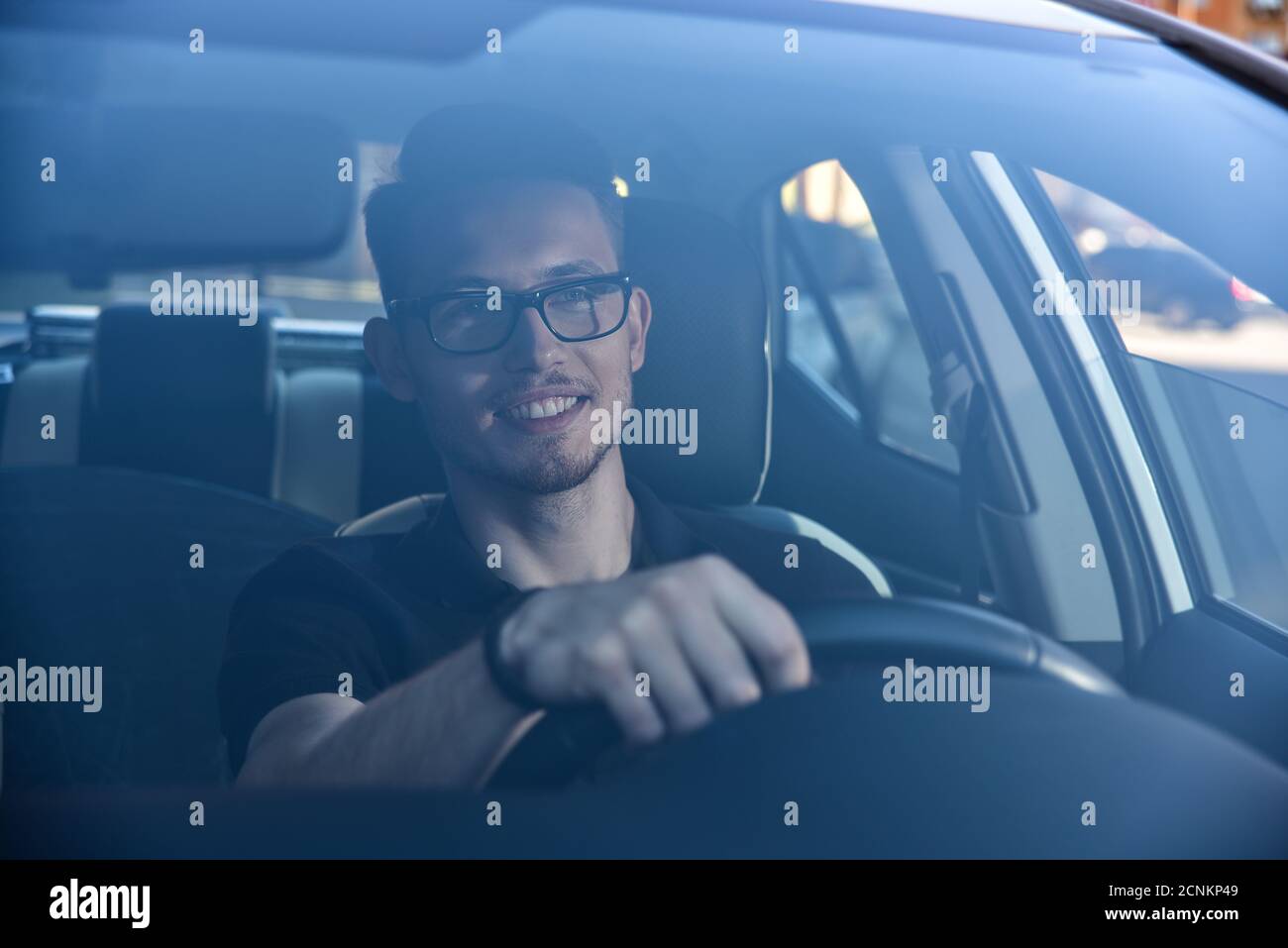 Guy driving hi-res stock photography and images - Alamy