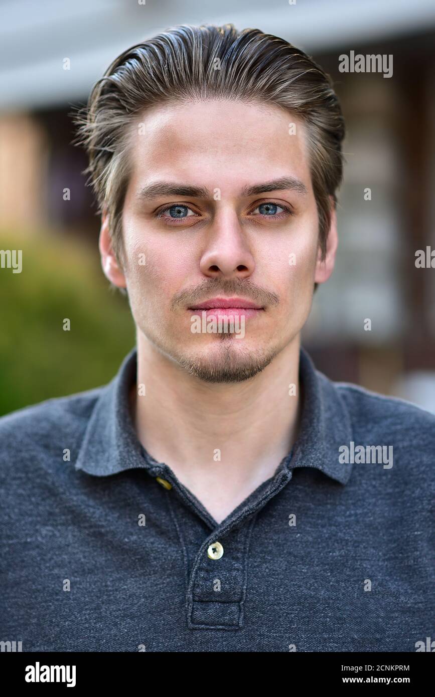 Young cute man stay at street Stock Photo - Alamy