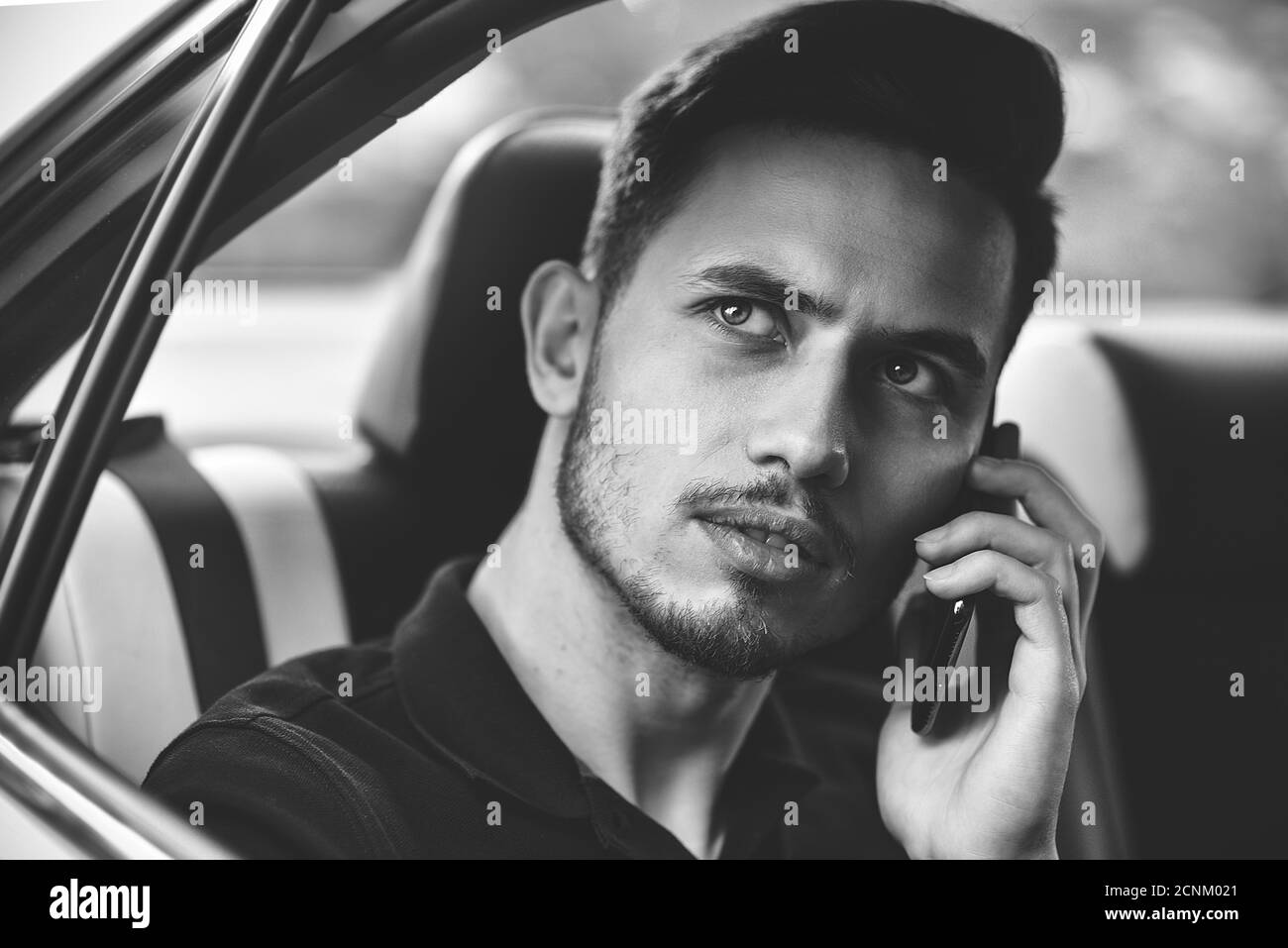Male passenger back seat car Black and White Stock Photos & Images - Alamy