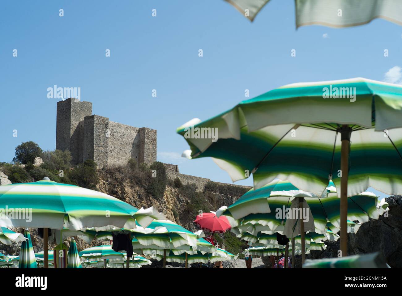 Lido Bagno Delle Donne, parasols, Rocca Aldobrandesca fortress ...