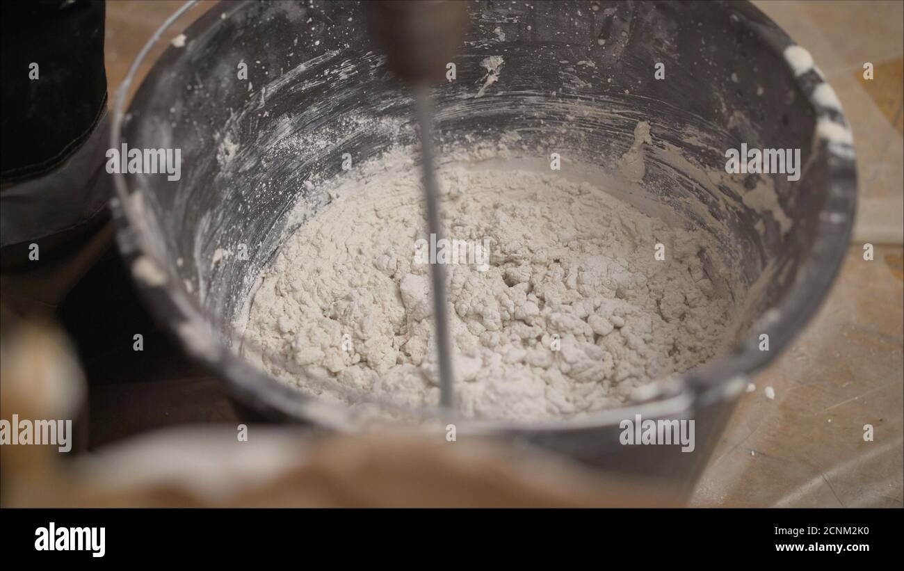 Cement in a bucket hi-res stock photography and images - Alamy