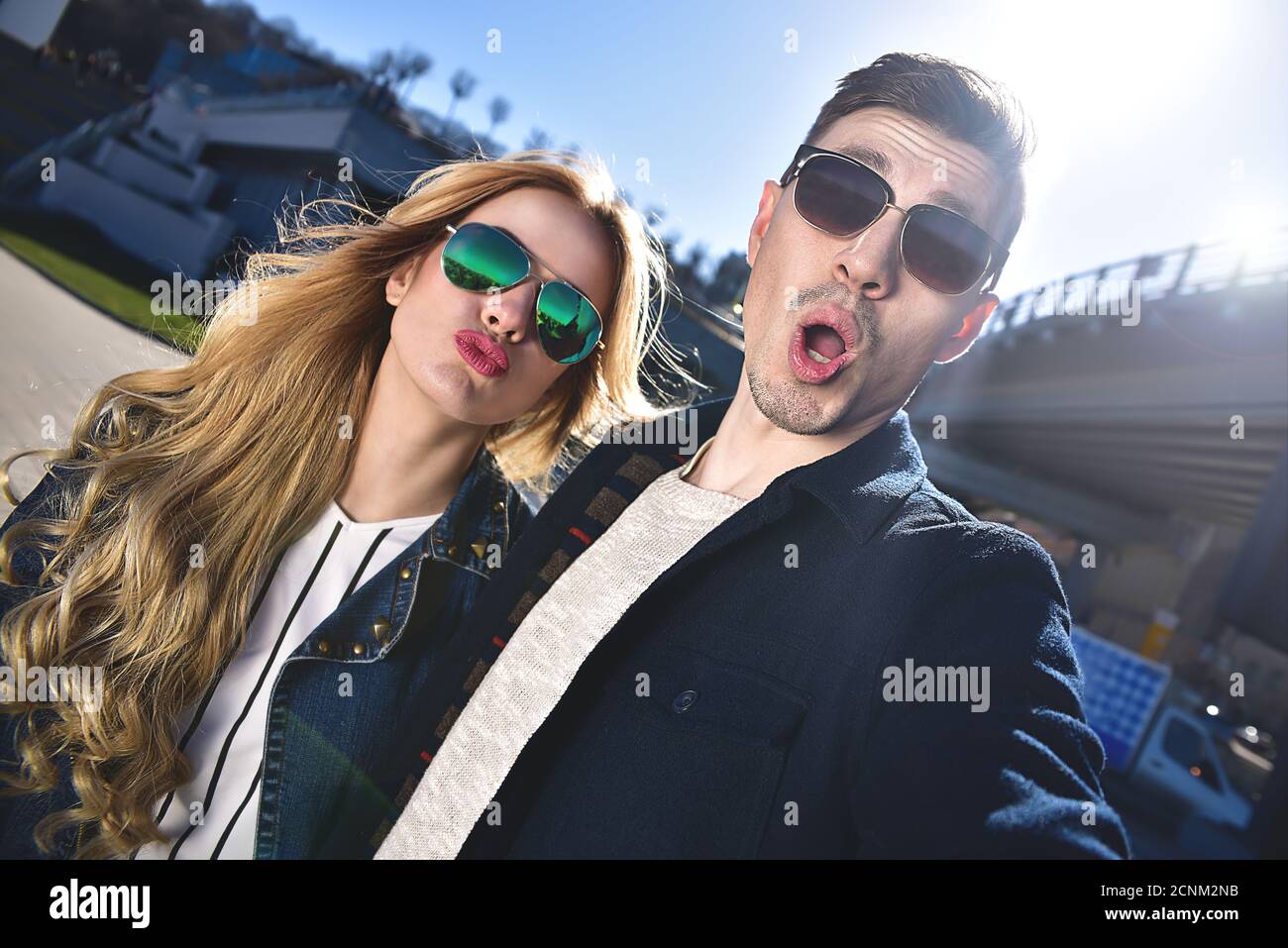 Pretty tourists make funny photos for travel blog in Europe Stock Photo ...