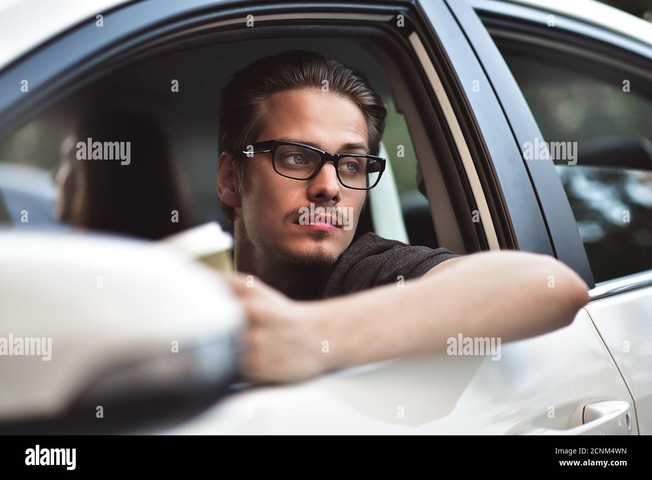 Close up man driving car hi-res stock photography and images - Alamy