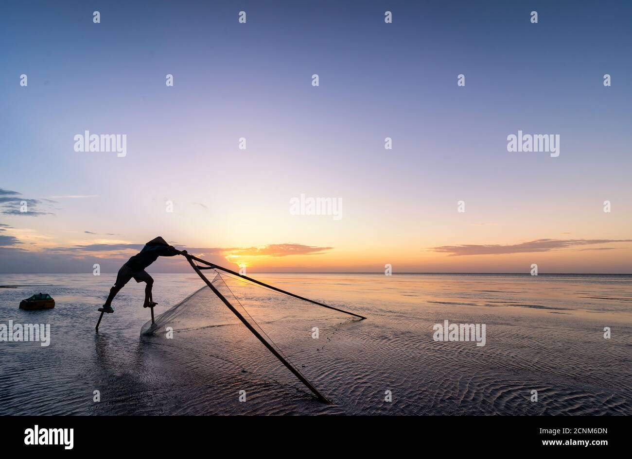 Shadow fishermen in the early morning Stock Photo - Alamy