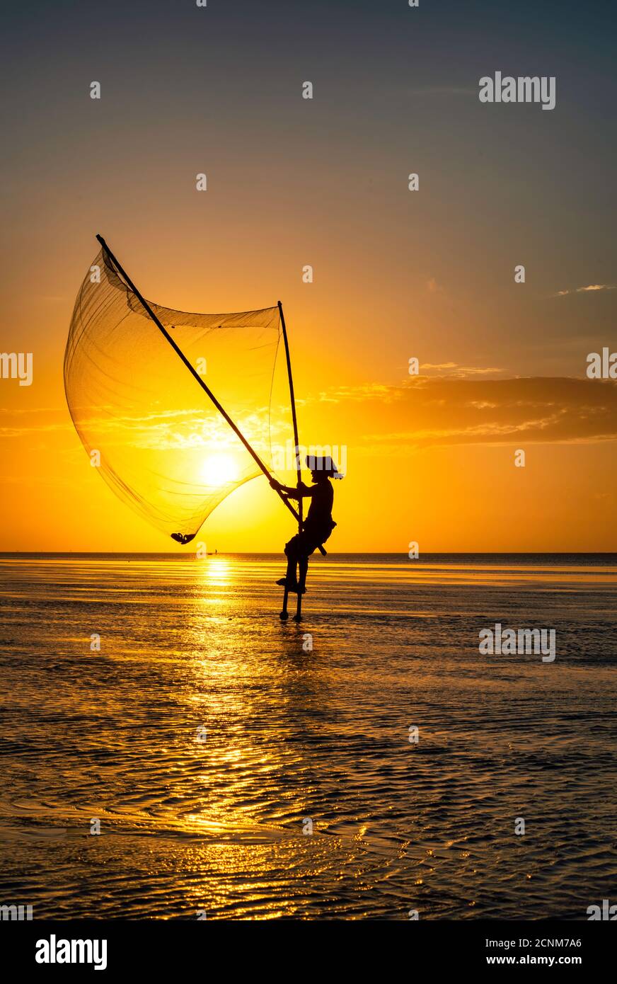 Shadow fishermen in the early morning Stock Photo - Alamy