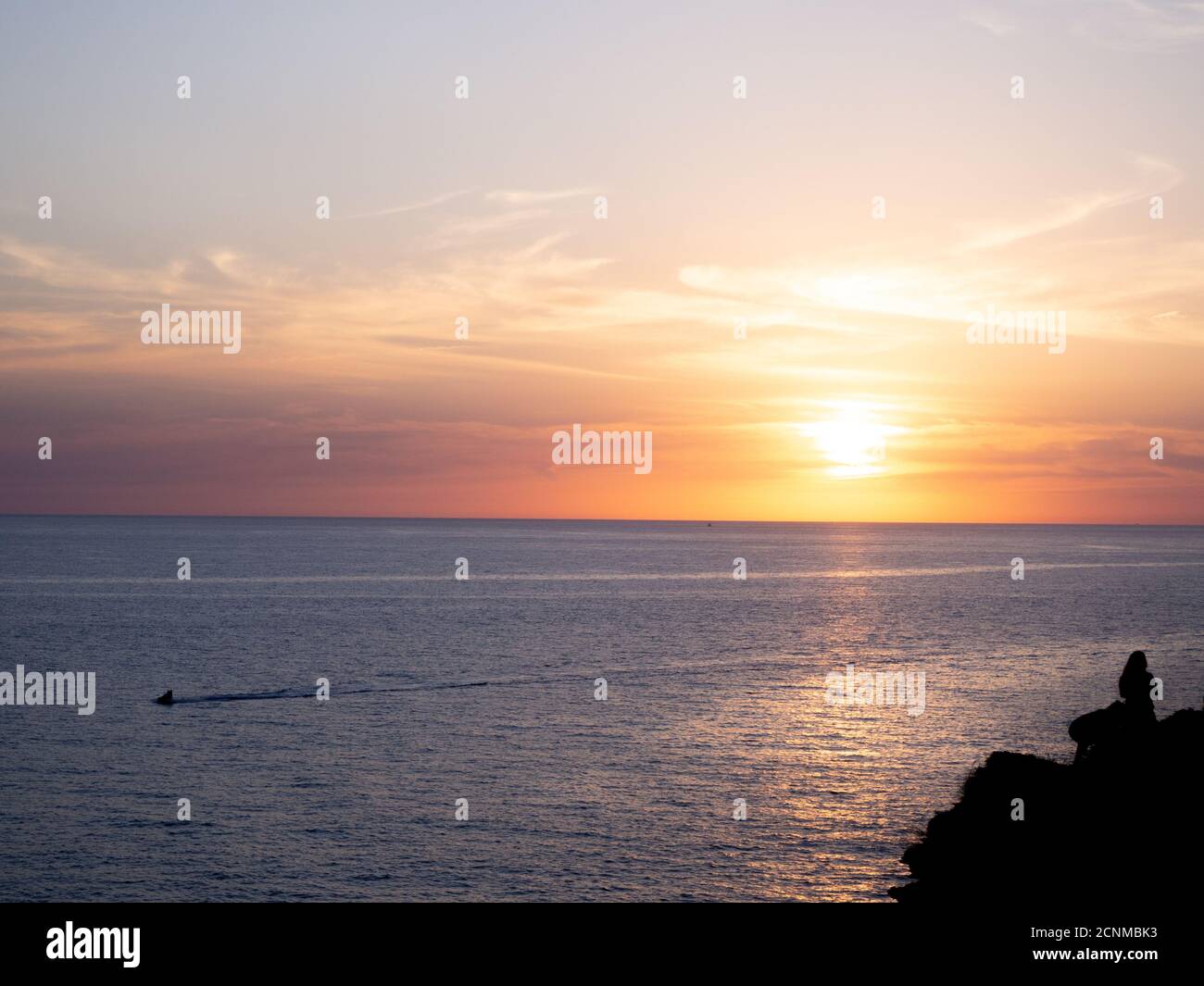 Mesmerizing scenery of a sea at sunset Stock Photo - Alamy