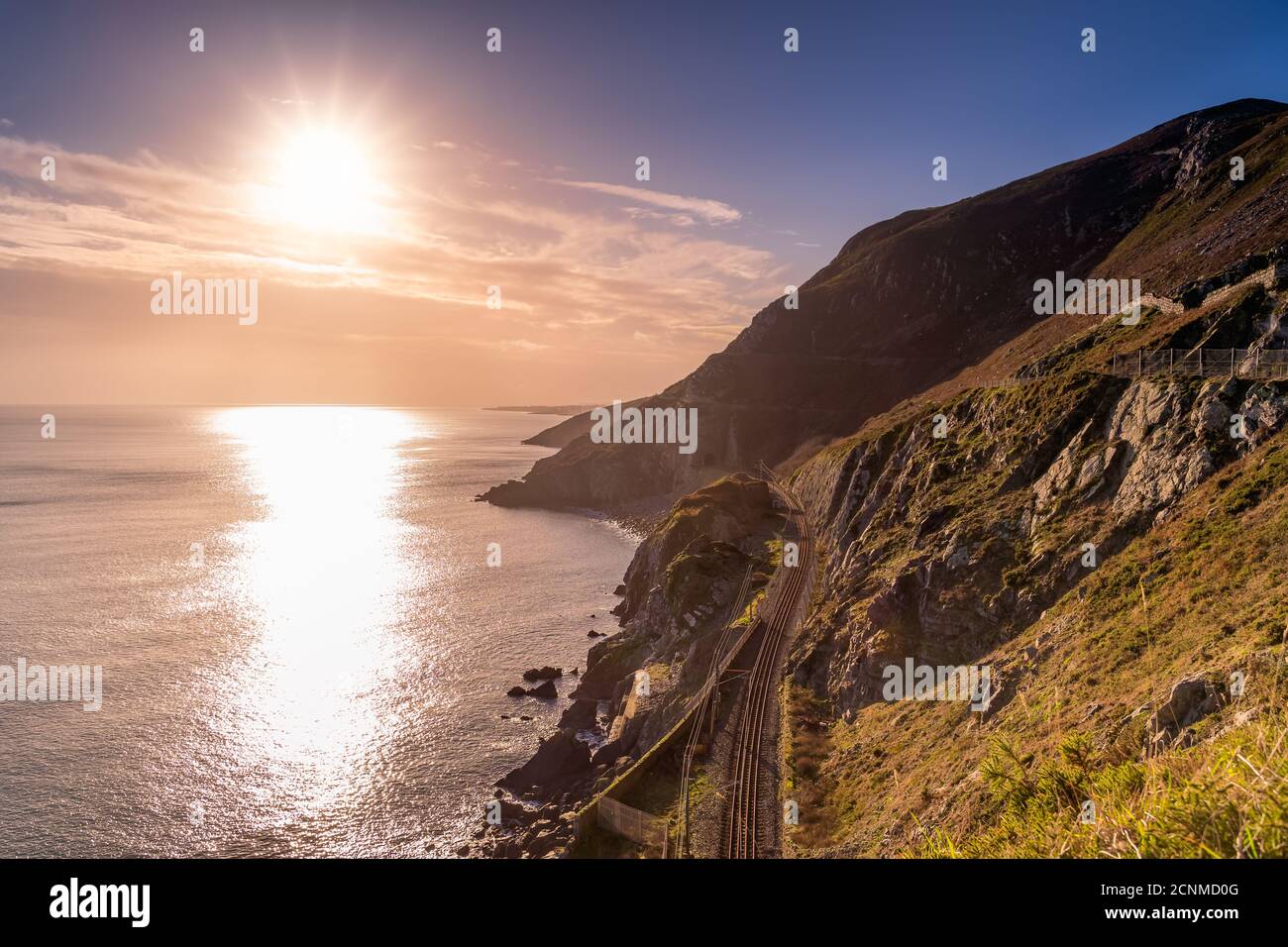 Sunrise with sun star on a Cliff Walk between Bray and Greystones Stock ...