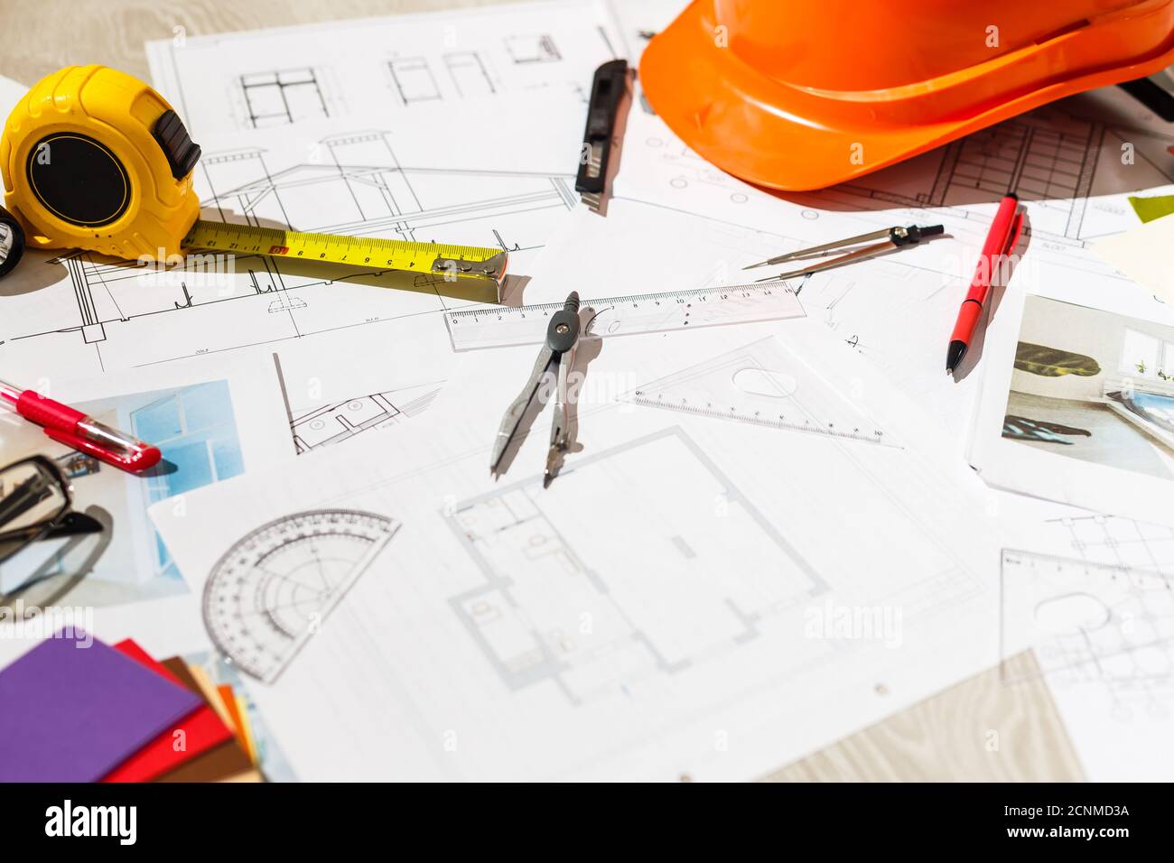 Architectural project, blueprints, blueprint rolls, ruler and pencil ... Architectural project, blueprints, blueprint rolls, ruler and pencil ...