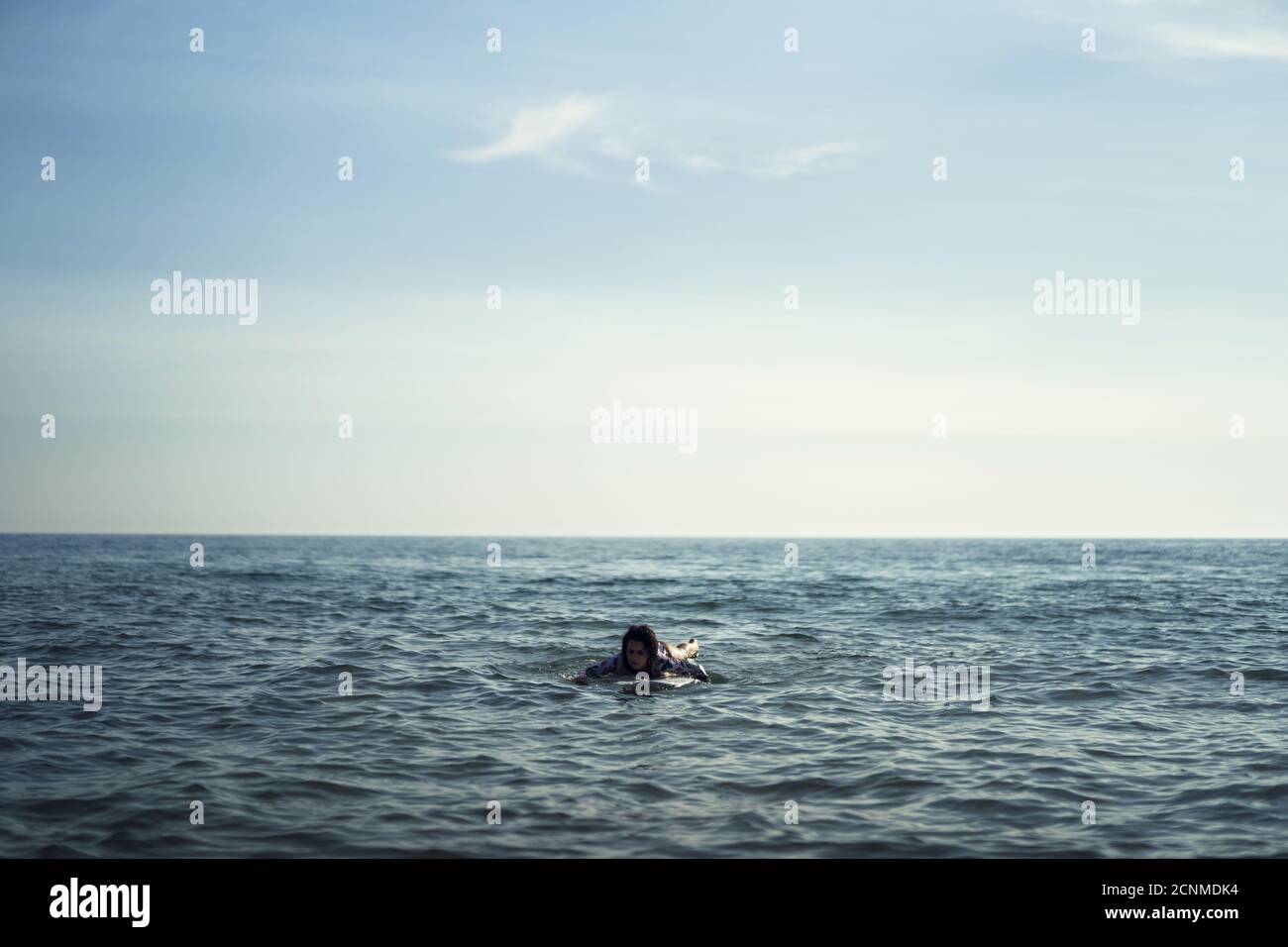 Attractive female surfing on the waves Stock Photo - Alamy