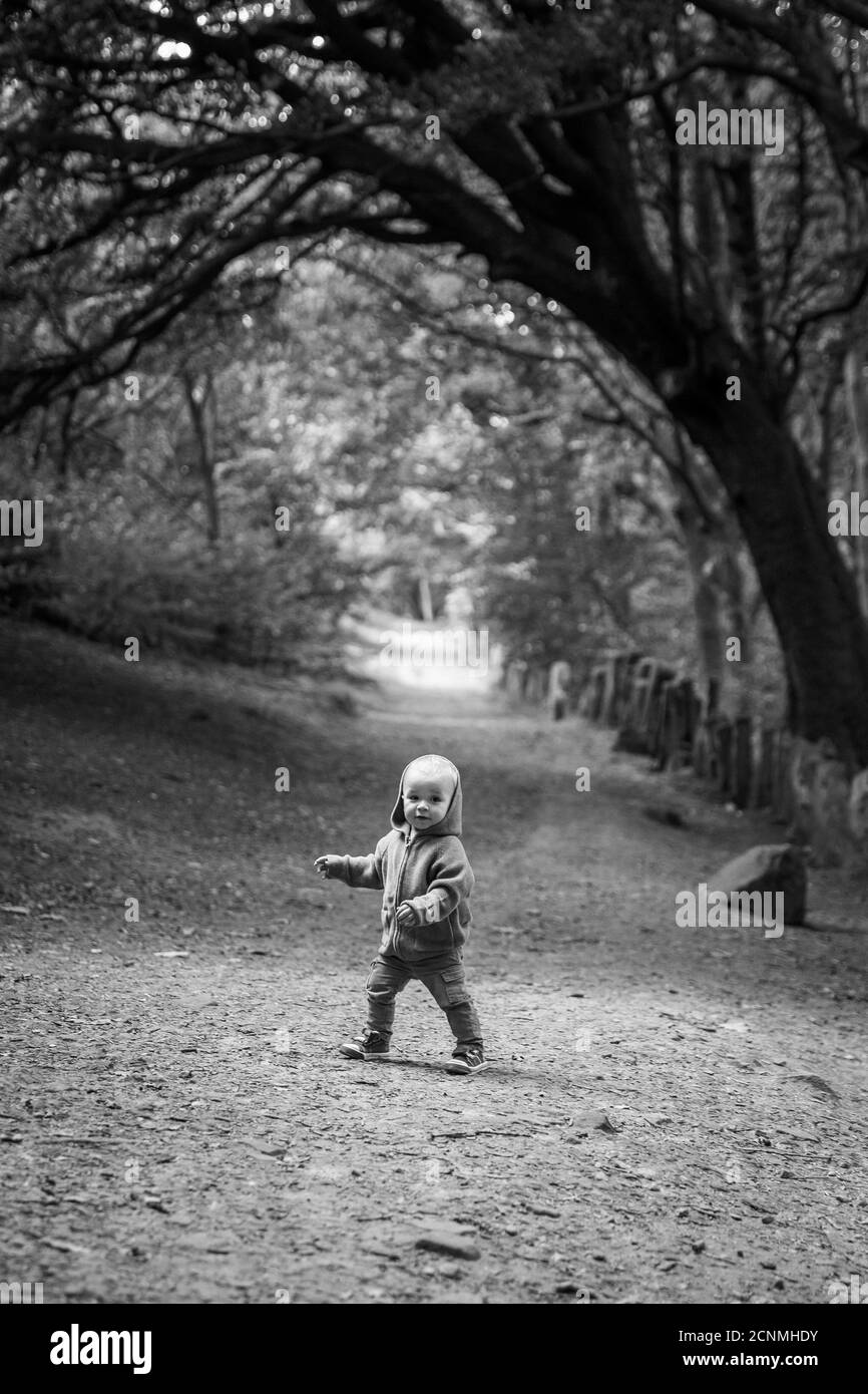 Cute kid playing Black and White Stock Photos & Images - Alamy