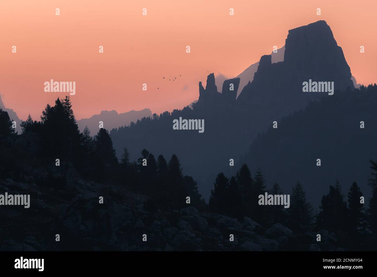 The striking rock formation Cinque Torri at sunrise in front of ...
