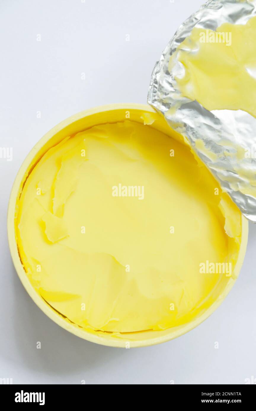 Margarine in box packaging on white background Stock Photo - Alamy