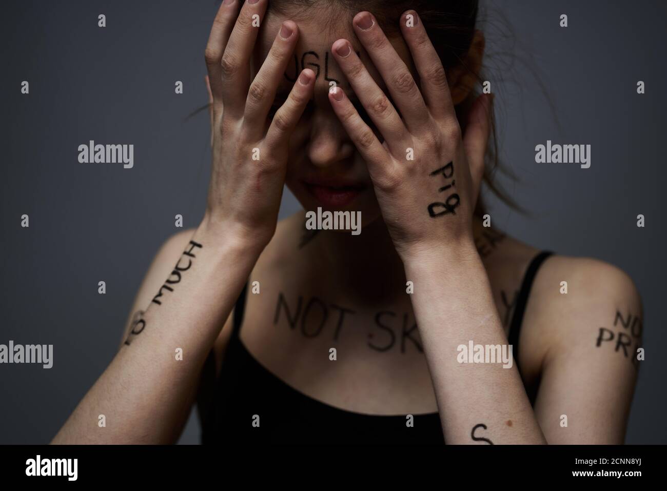 Woman with inscriptions on the body frustration and dissatisfaction ...