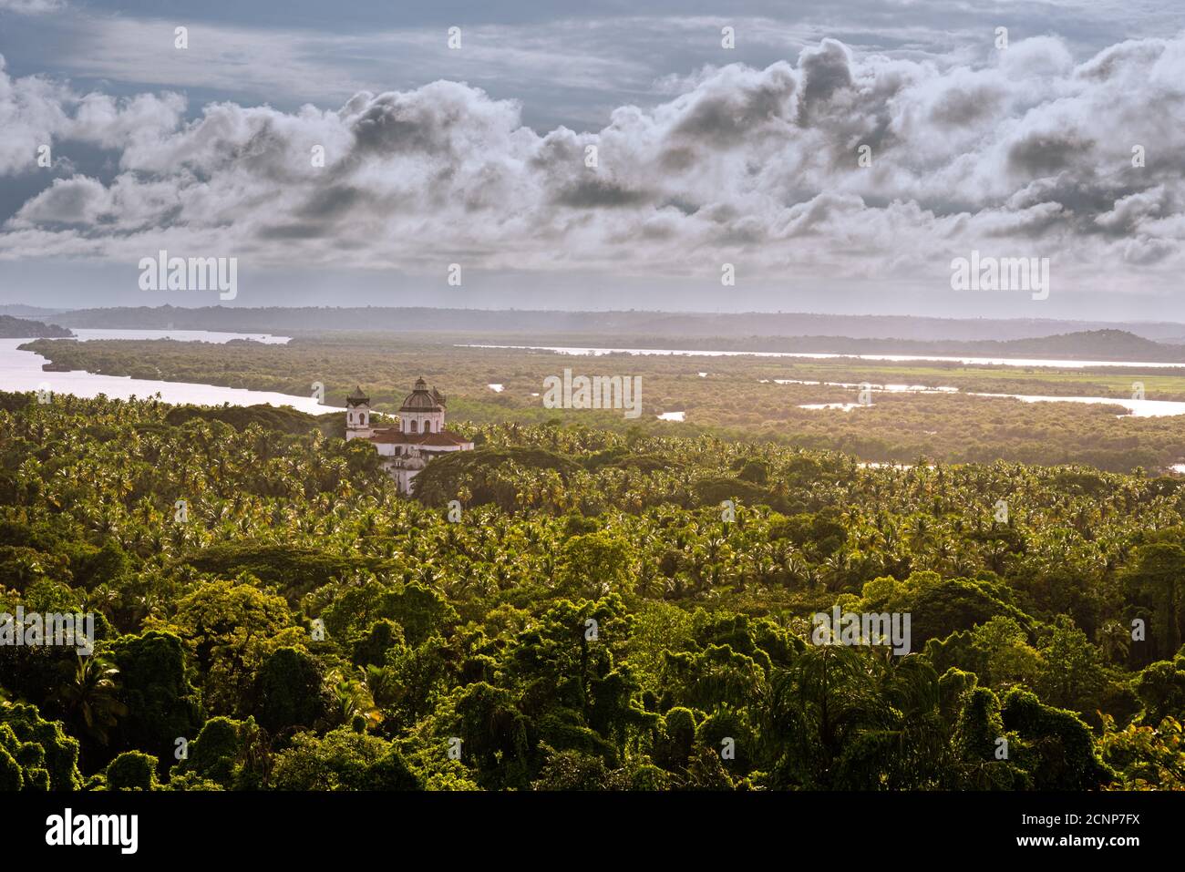 Aerial view of a tropical landscape in Goa, India with ancient catholic ...