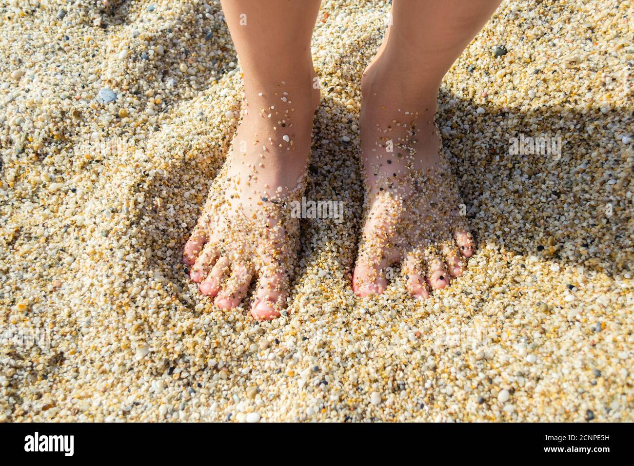 Child feet sand hi-res stock photography and images - Alamy