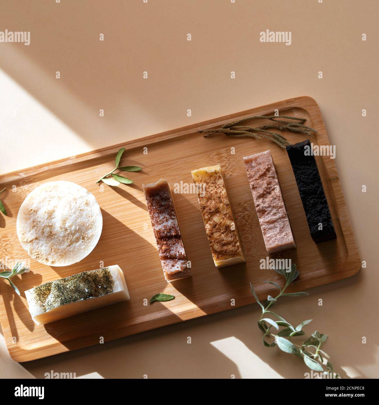 Wooden tray with handmade soap from natural ingredients. Warm ...