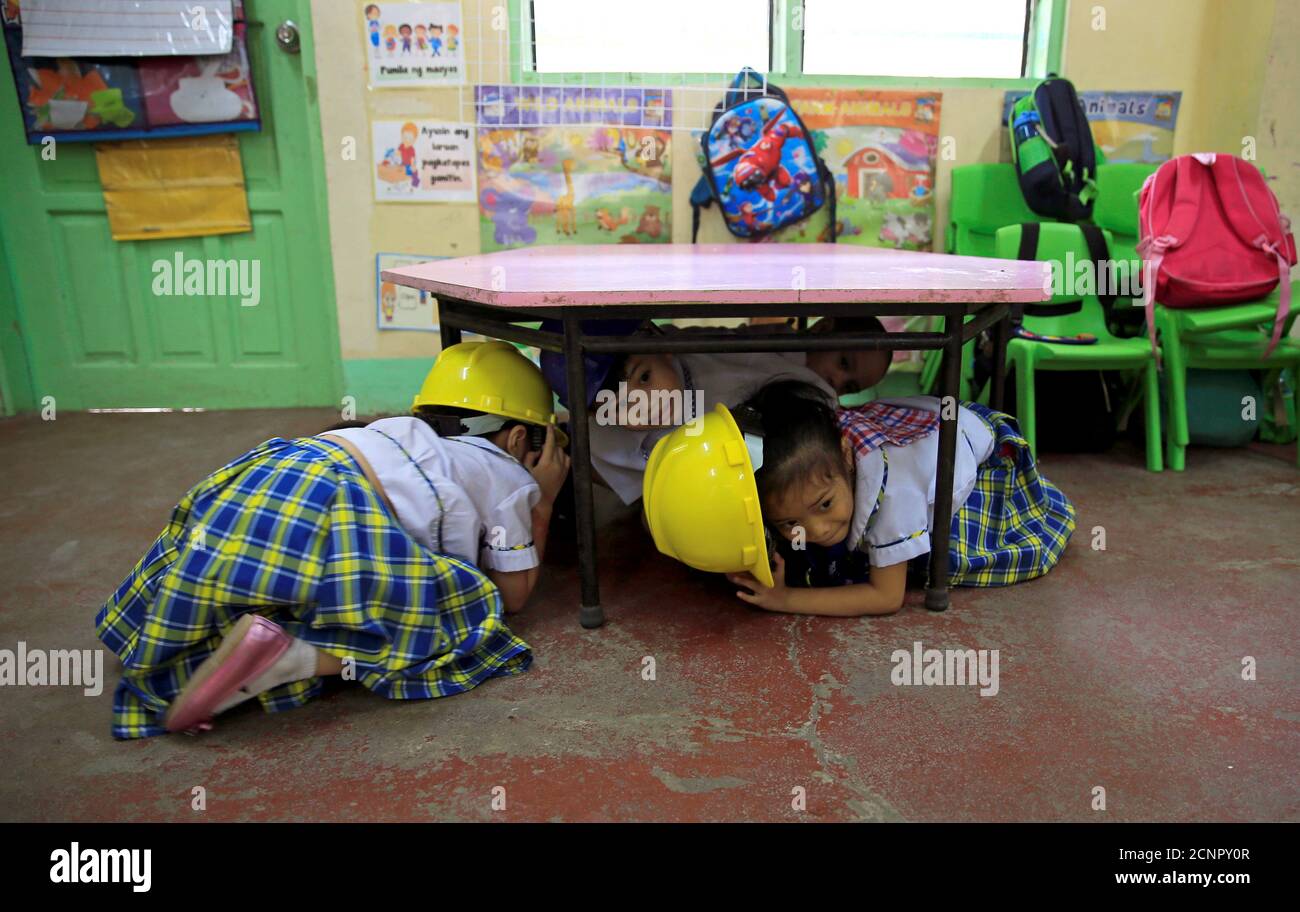 Hide under desk hi-res stock photography and images - Alamy