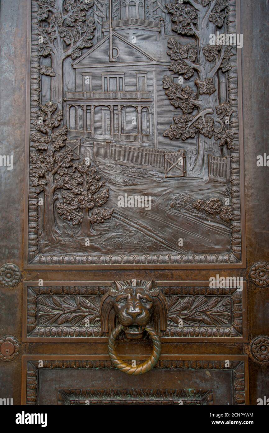 Close-up of one of the bronze doors at the state capitol building in ...