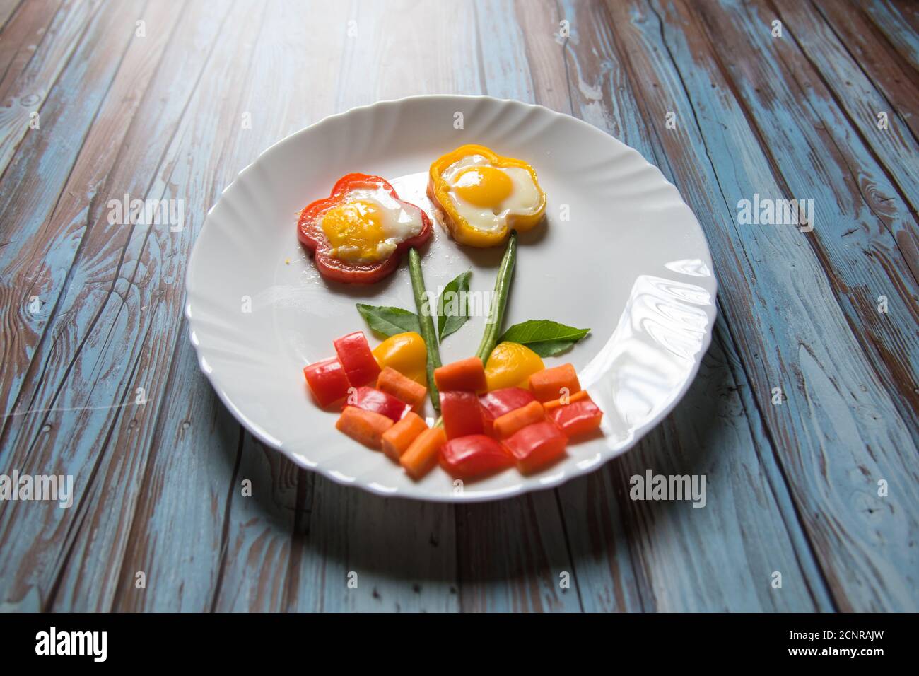 Flower shaped art created with food ingredients Stock Photo - Alamy