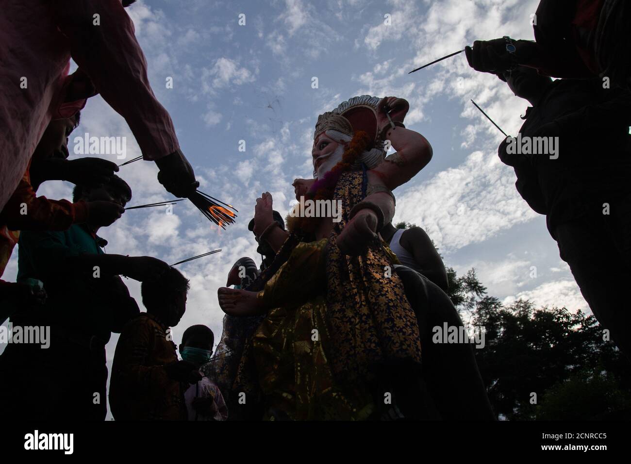 Kathmandu, Nepal. 18th Sep, 2020. Devotees praying in front of an idol ...