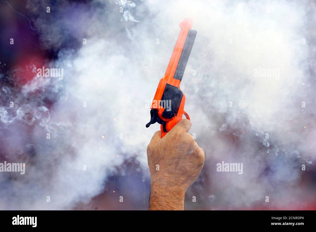 Starter Pistol Smoke High Resolution Stock Photography and Images - Alamy