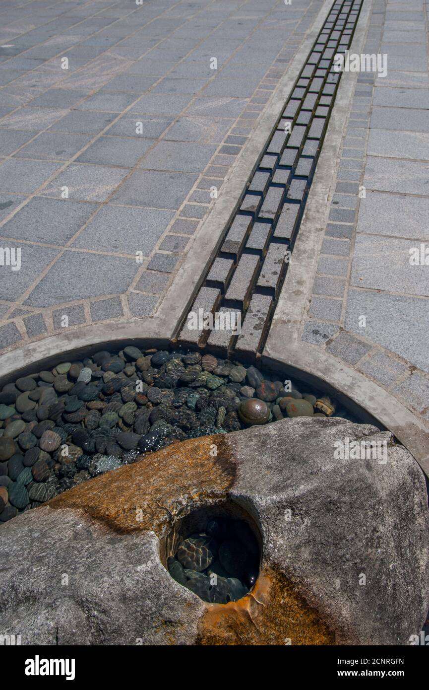 A water feature incorporated into the walkway at the Bellevue Botanical ...