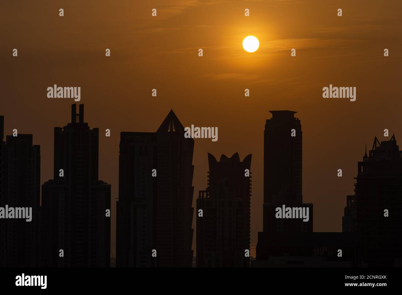 Dubai skyline in sunset hi-res stock photography and images - Alamy