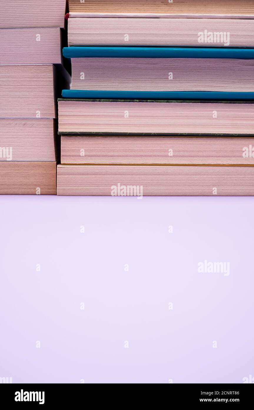 Books stack on top of each other Stock Photo - Alamy