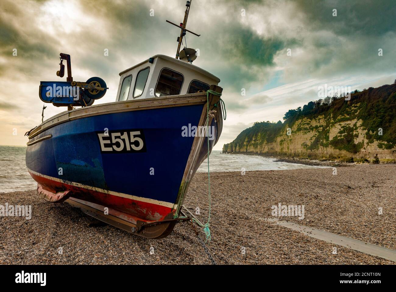 A fishing boat on the beach at Beer, Devon, England. Uk Stock Photo - Alamy
