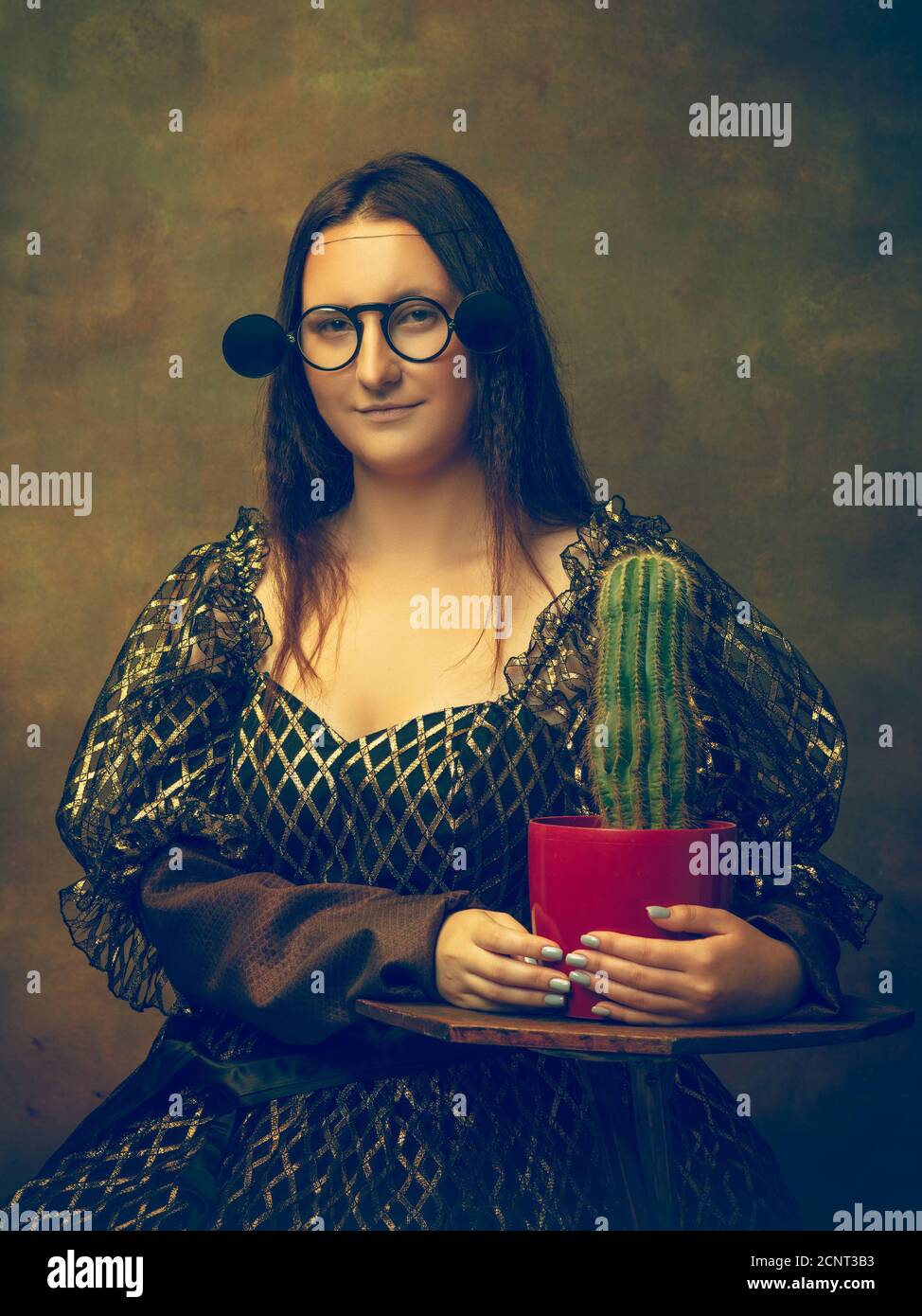 Cactus friend. Young woman as Mona Lisa, La Gioconda isolated on dark ...