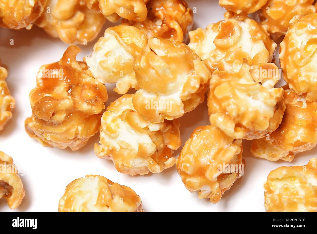 Delicious caramelized popcorn macro junk food photo Stock Photo - Alamy