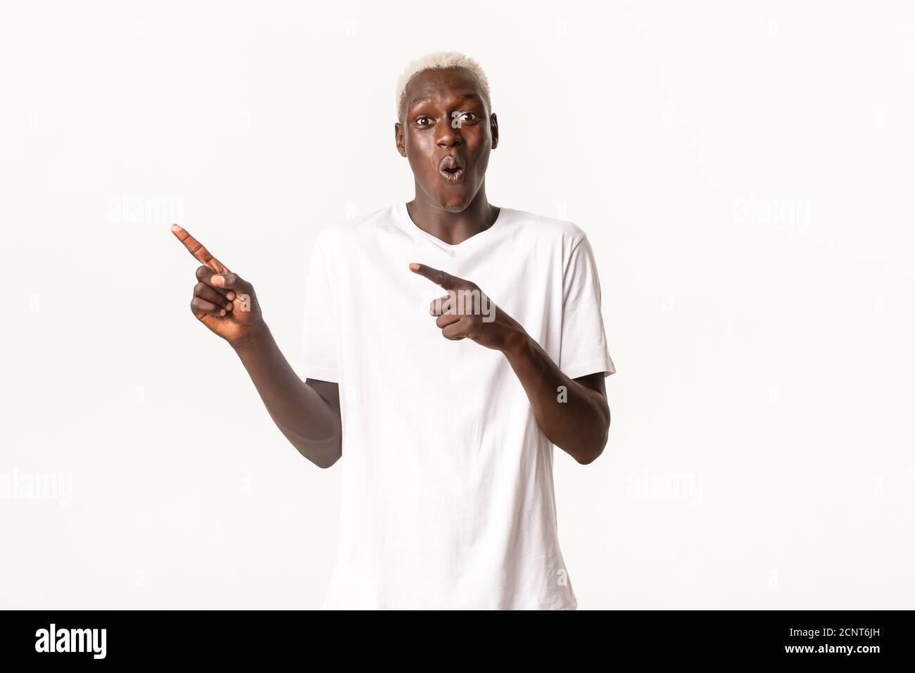 Portrait of surprised and amused handsome african-american male student ...