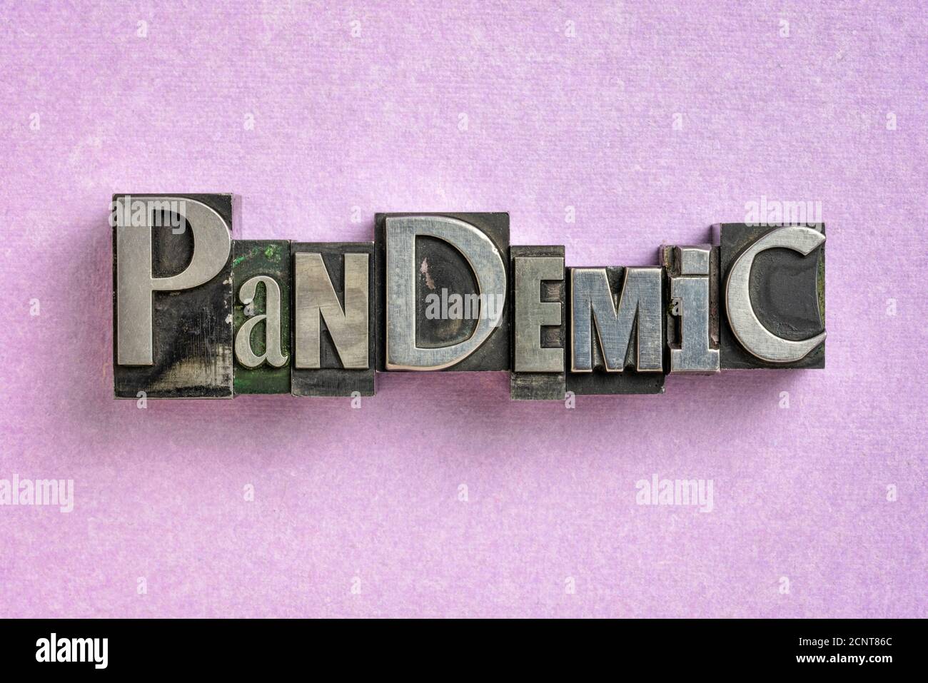 pandemic word abstract in gritty vintage letterpress metal types, mixed ...