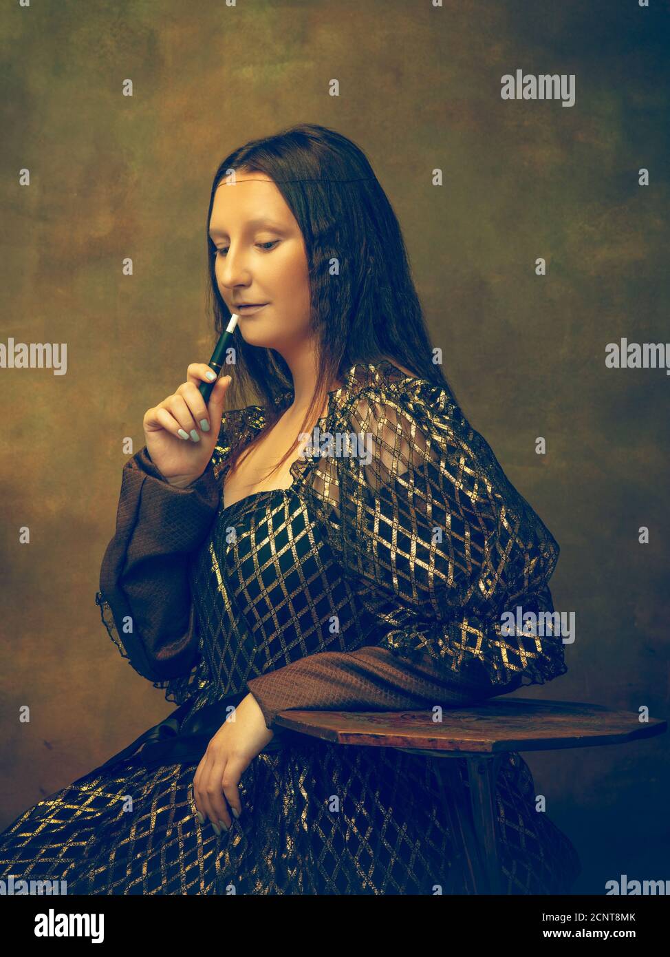Smoking. Young woman as Mona Lisa, La Gioconda isolated on dark green ...