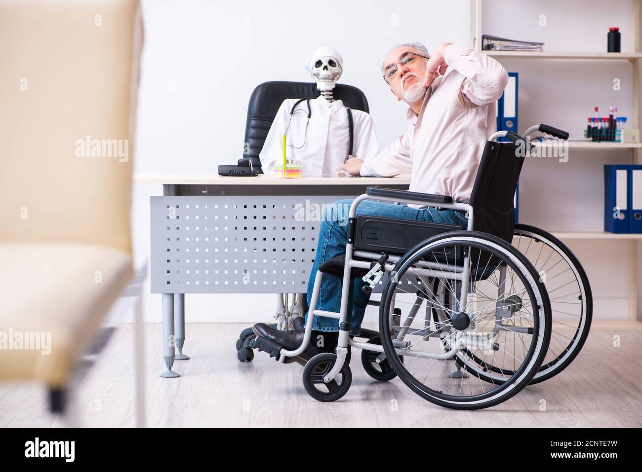 Medical skeleton in wheelchair hi-res stock photography and images - Alamy