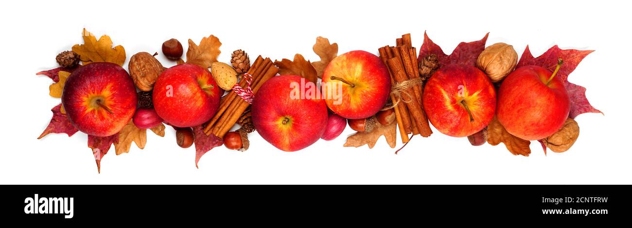 Autumn border of apples, leaves, and fall decor. Above view isolated on ...