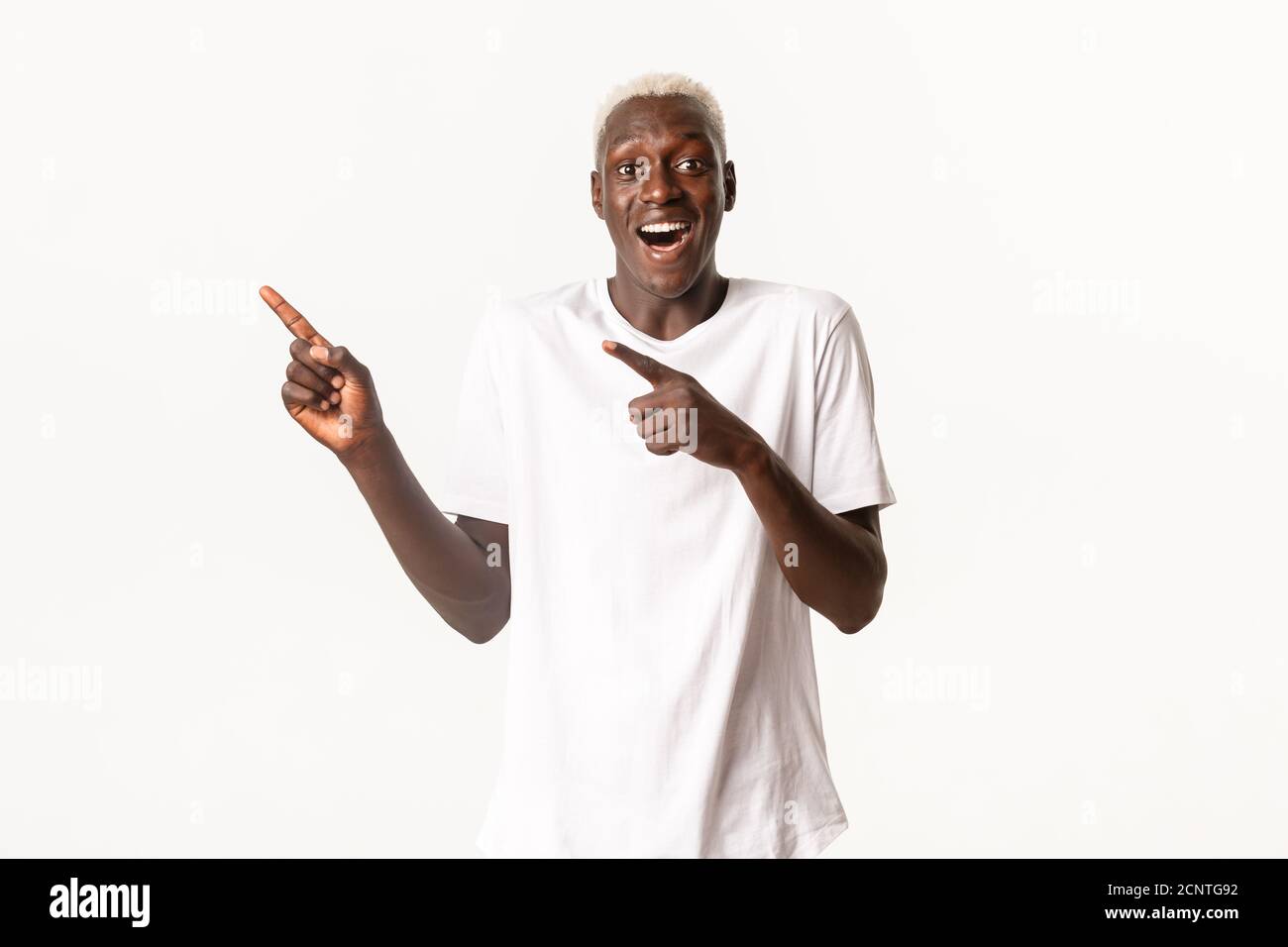 Portrait of excited happy african-american blond man, looking ...