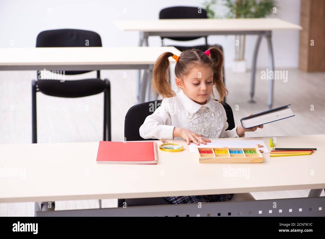 Small girl in the early development concept Stock Photo - Alamy