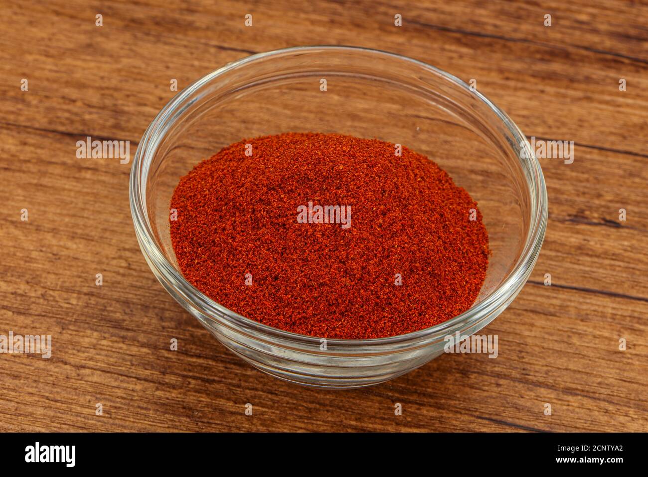 Dry paprika powder in the bowl for cooking Stock Photo - Alamy