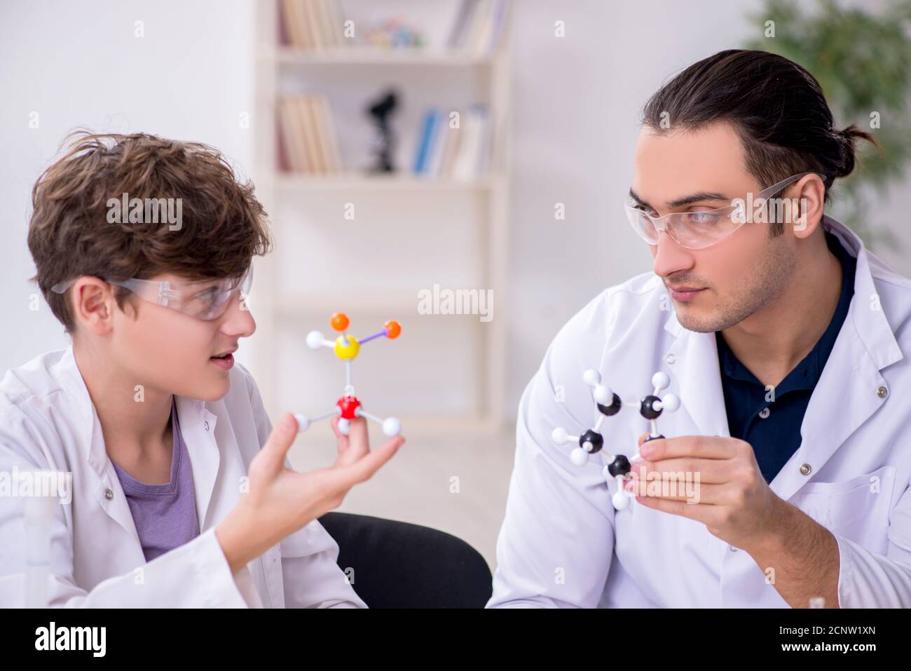 Young father and son chemists in the laboratory Stock Photo - Alamy