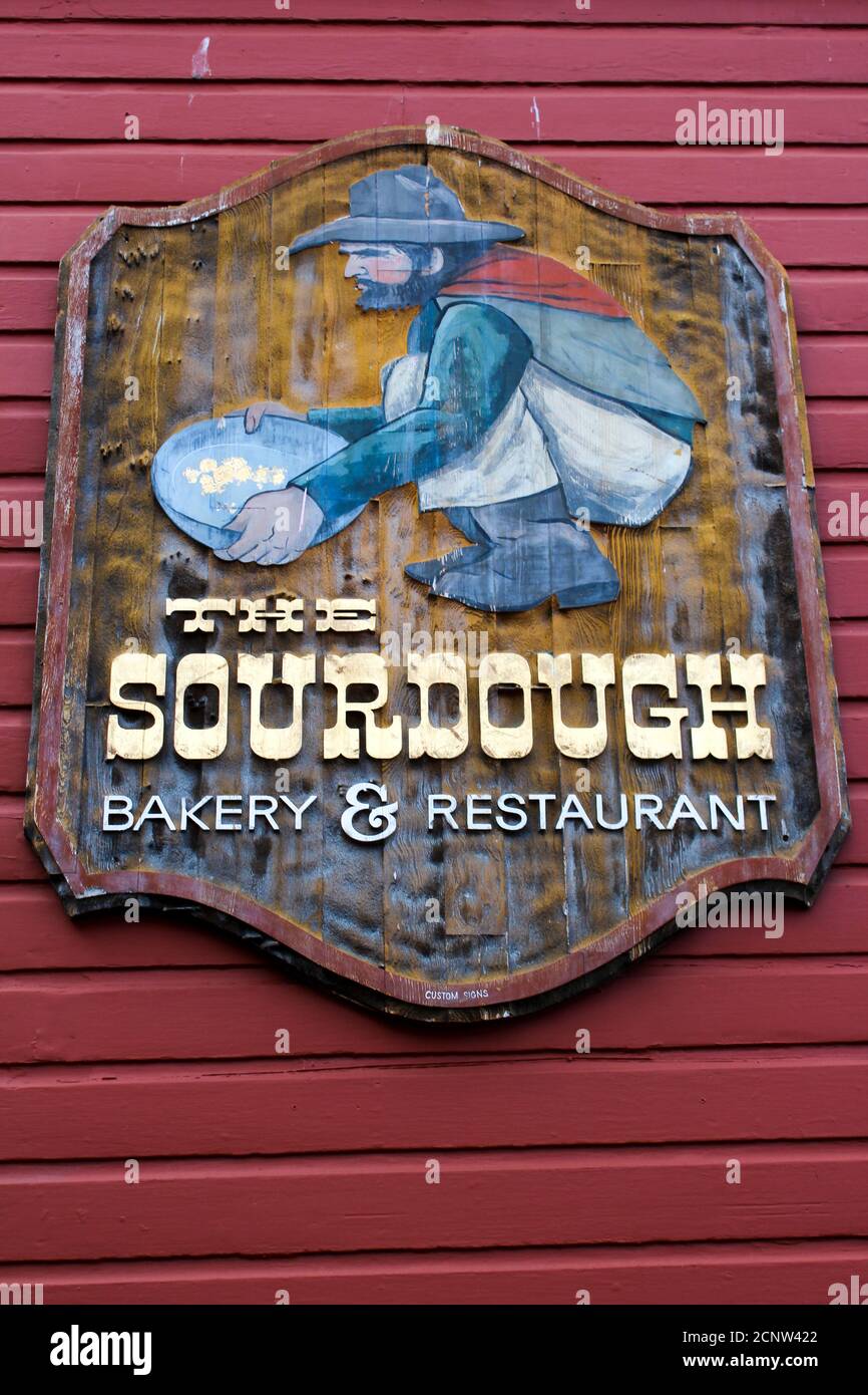 USA road trip cowboy city street painting flag Stock Photo - Alamy