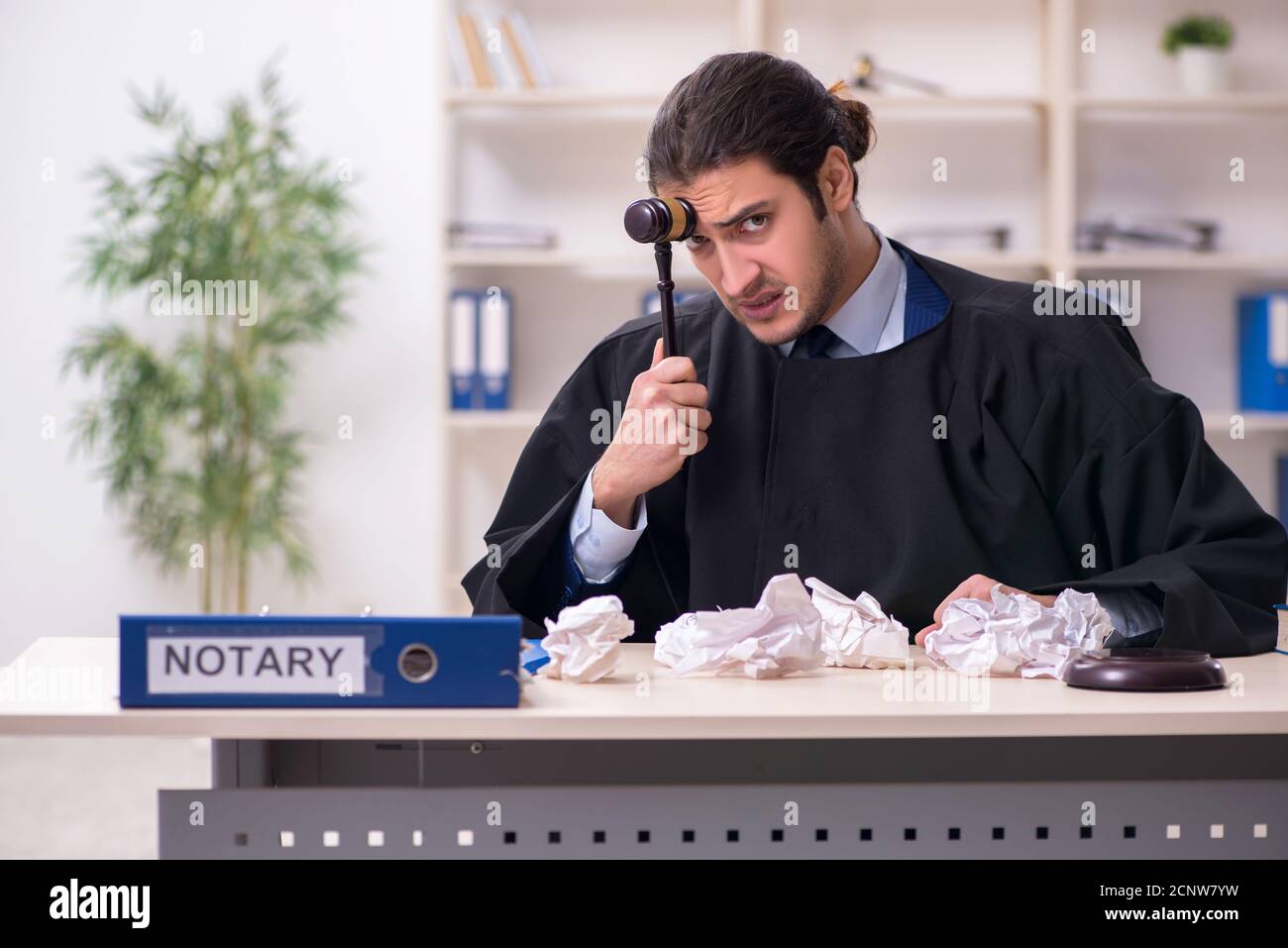 Young judge working in courthouse Stock Photo - Alamy