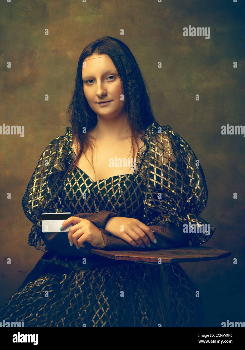 Online shop. Young woman as Mona Lisa, La Gioconda isolated on dark ...