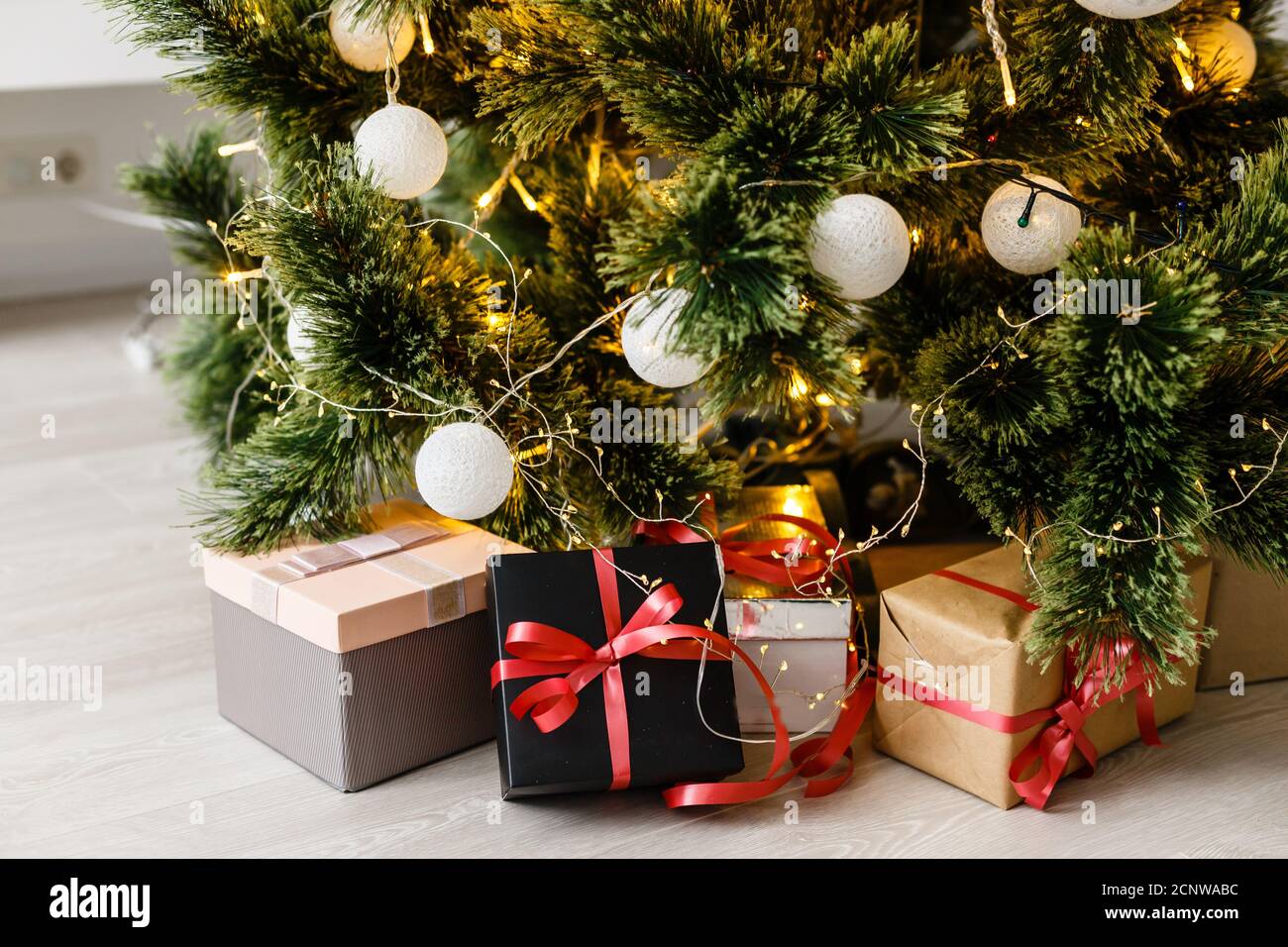 christmas tree with presents under Stock Photo - Alamy